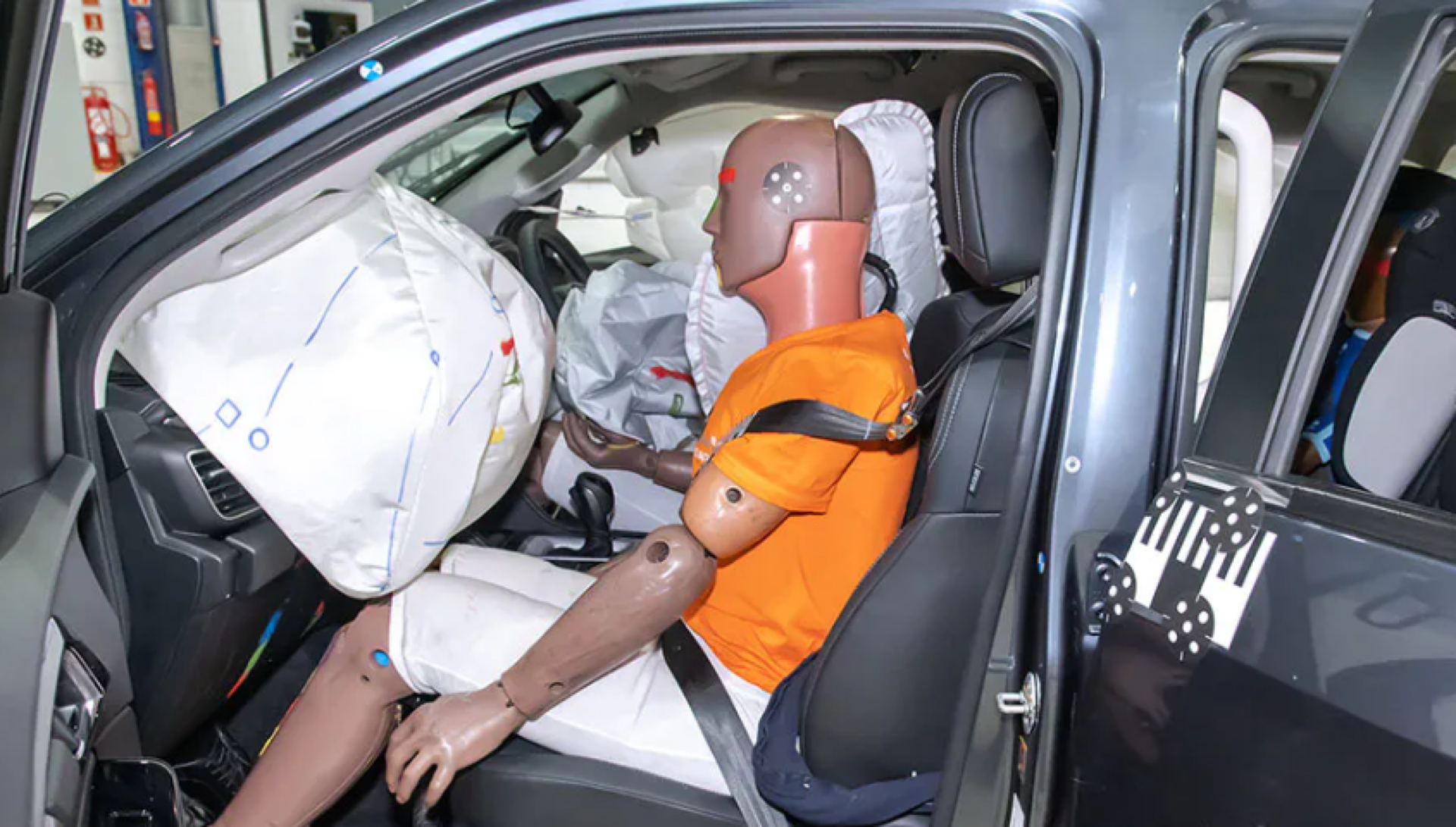 Why are women under-represented in car safety tests?
