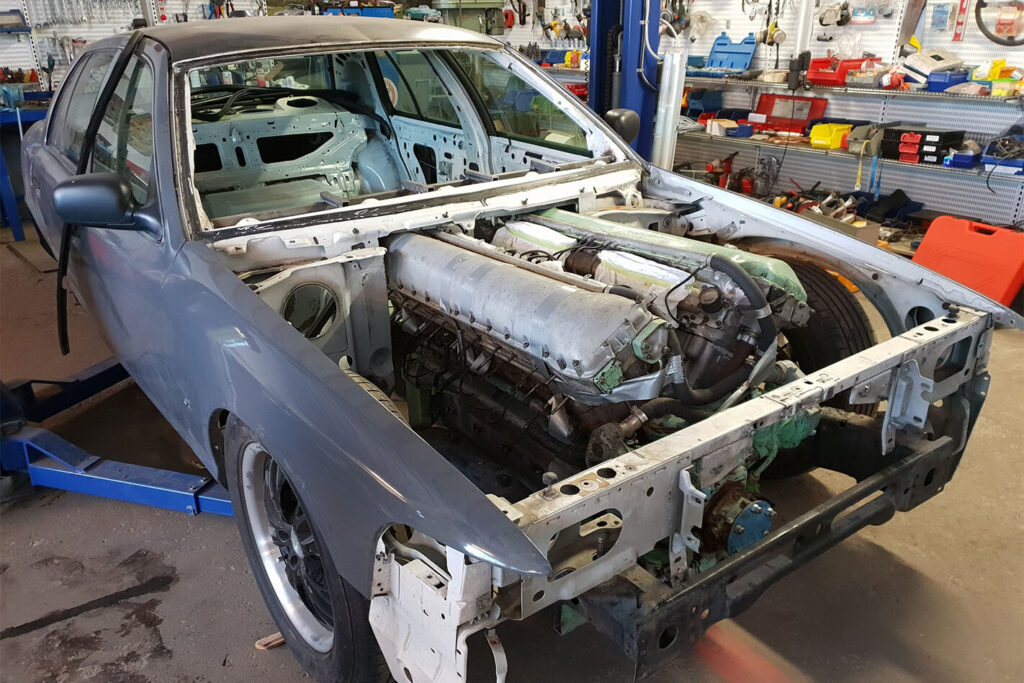 Ford Crown Vic undergoing 27-litre V12 tank engine swap
