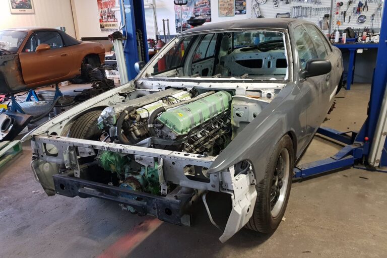 Ford Crown Vic undergoing 27-litre V12 tank engine swap